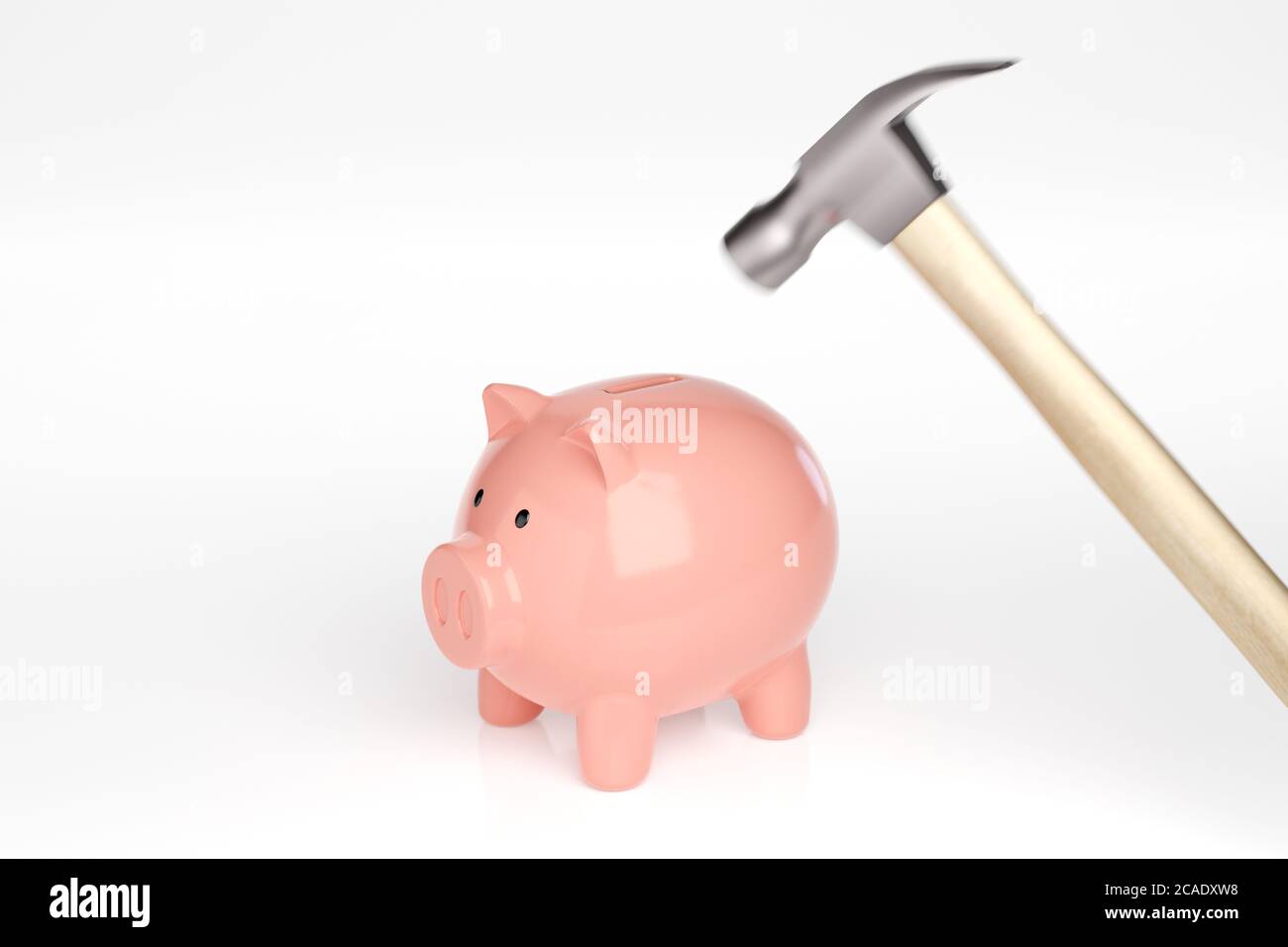 Breaking the piggy bank with a hammer Stock Photo - Alamy