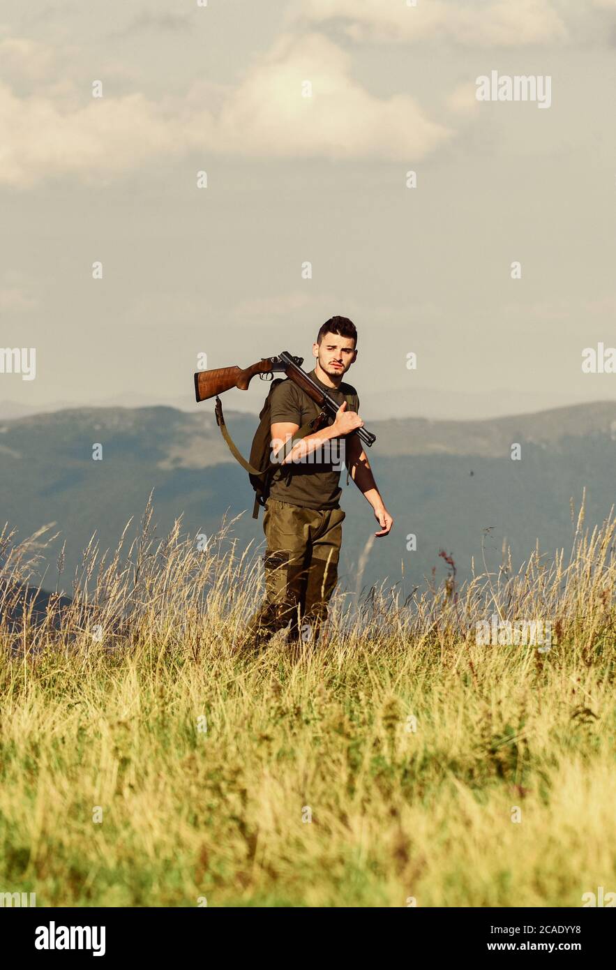 for better tomorrow. soldier in field. polygon. muscular man hold ...