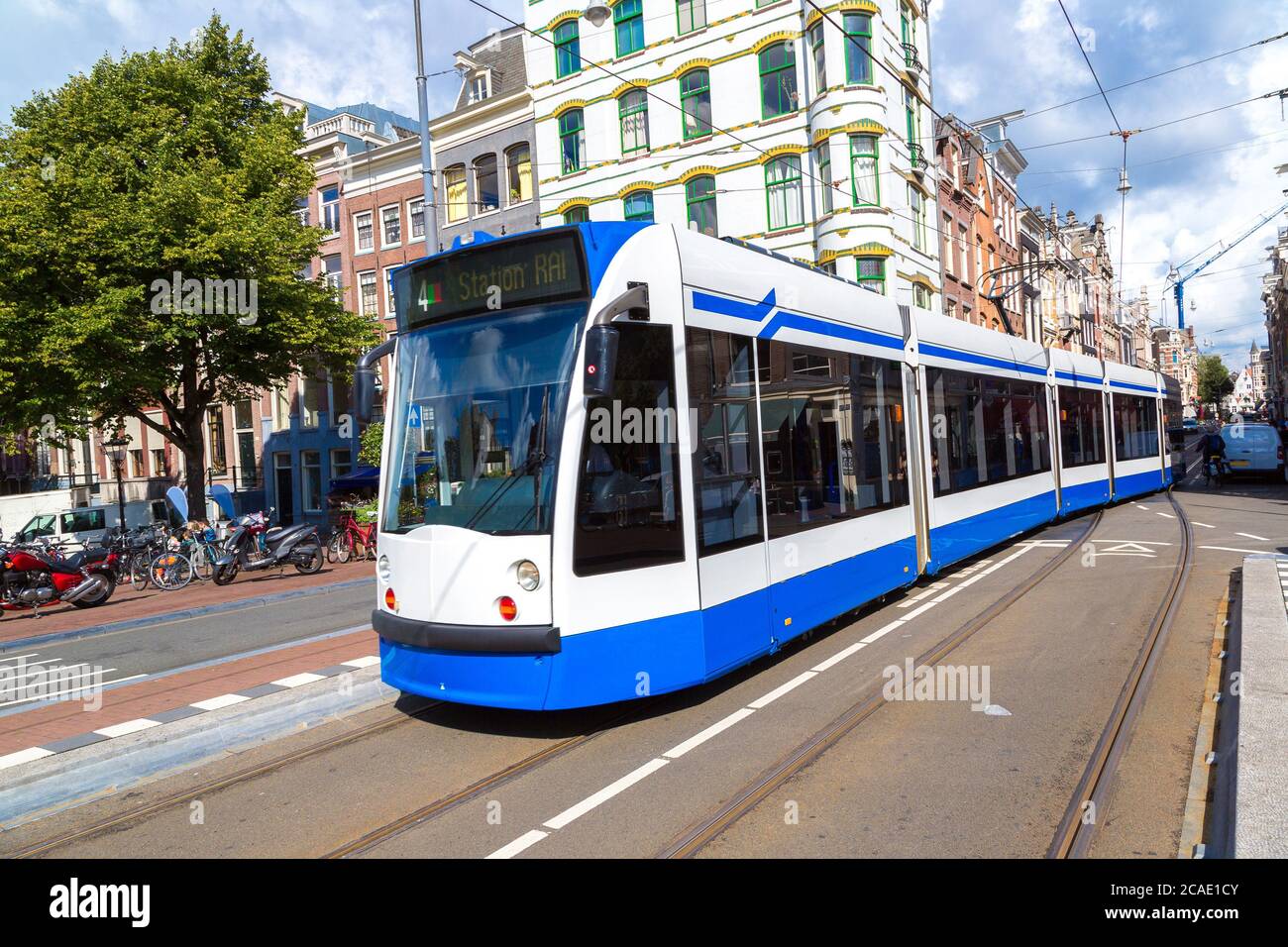 Modern tram in Amsterdam. Amsterdam is the capital and most populous ...