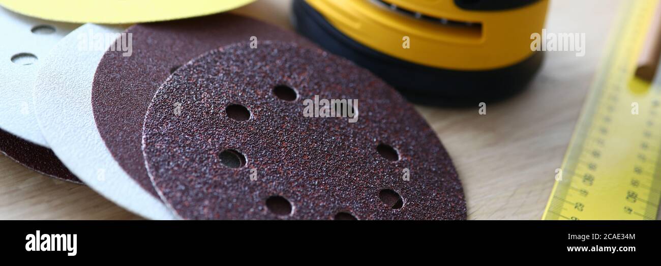 On table are tools for grinding surface and ruler Stock Photo - Alamy