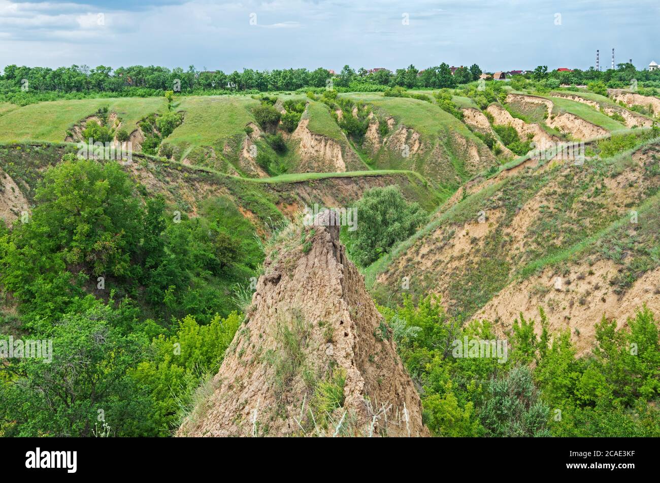 Gully is landform created by running water, eroding fast soil ...