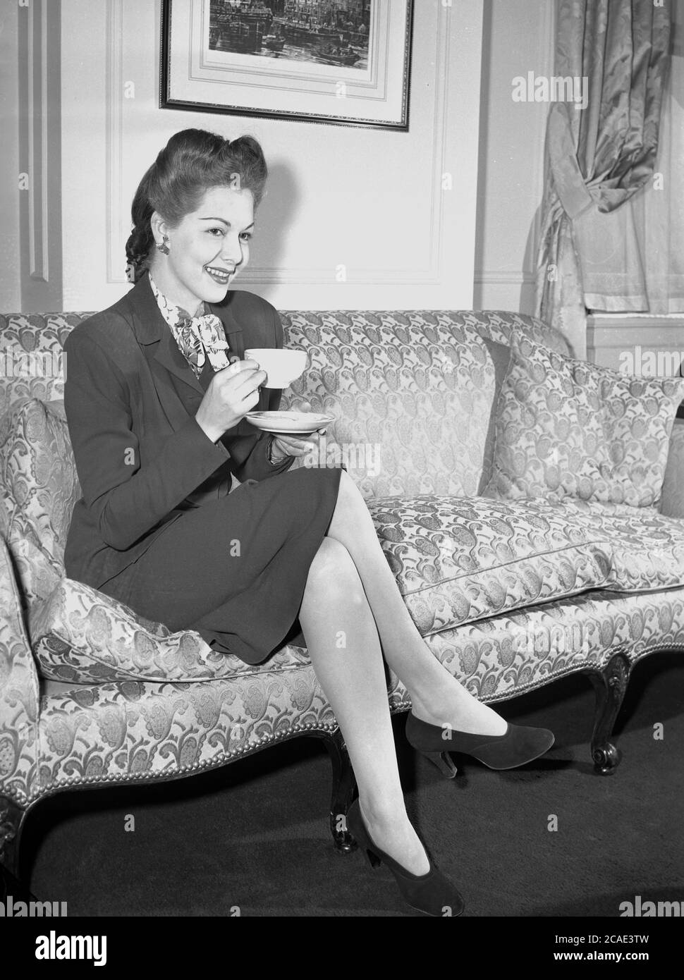 circa 1940s, historical picture of an attractive, elegant, well-dressed ...