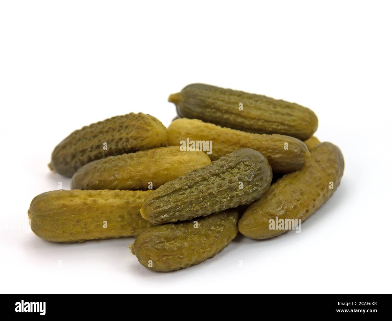 Pickles isolated against a white background Stock Photo - Alamy