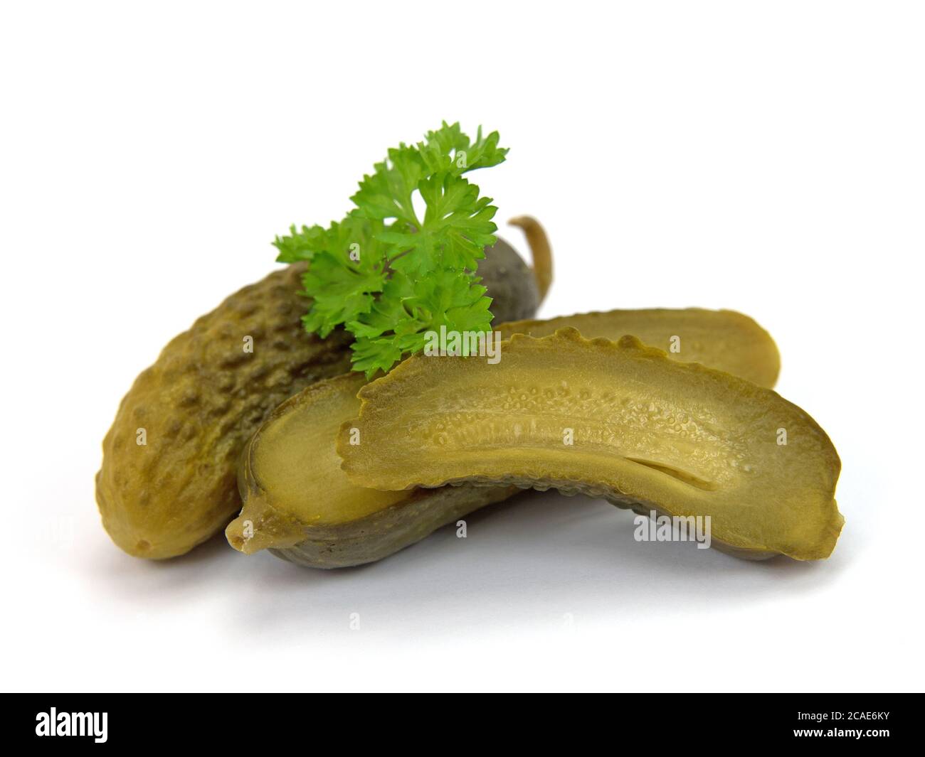 Pickles isolated against a white background Stock Photo - Alamy