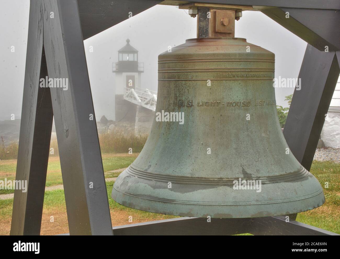 Foggy day at historic Marshall Point Light, Port Clyde Maine. The large ...