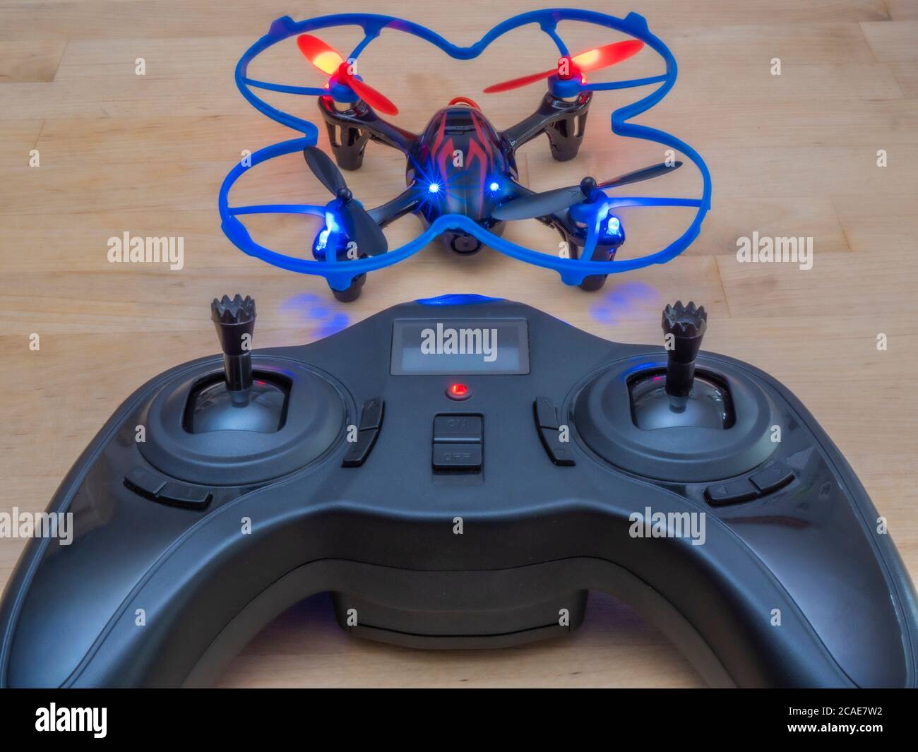 Closeup of a Hubsan quadcopter, with LED lights, and the controller ...