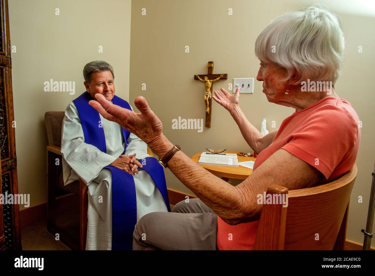 Catholic priest confession hi-res stock photography and images - Alamy