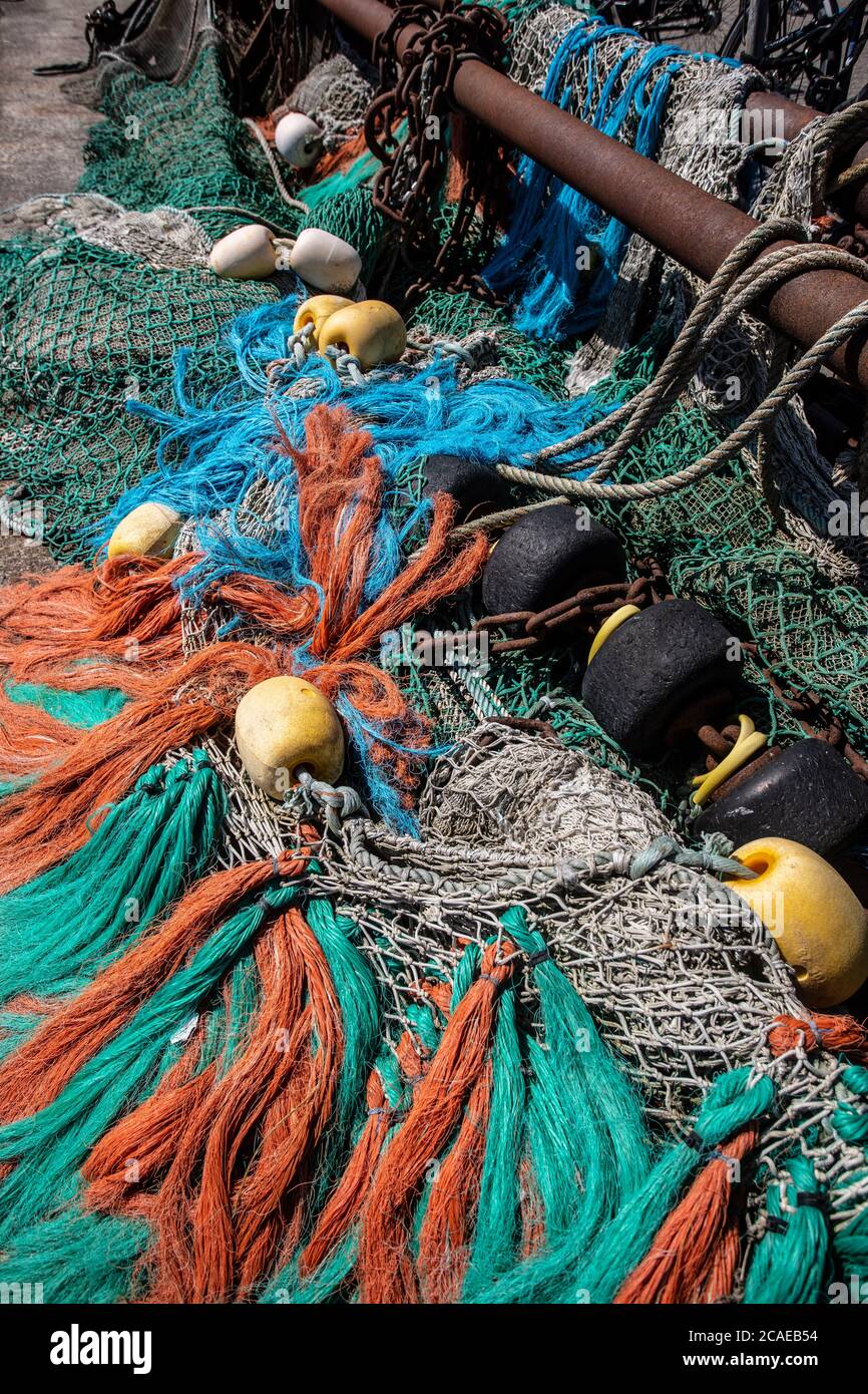 fishing net in a harbor Stock Photo - Alamy