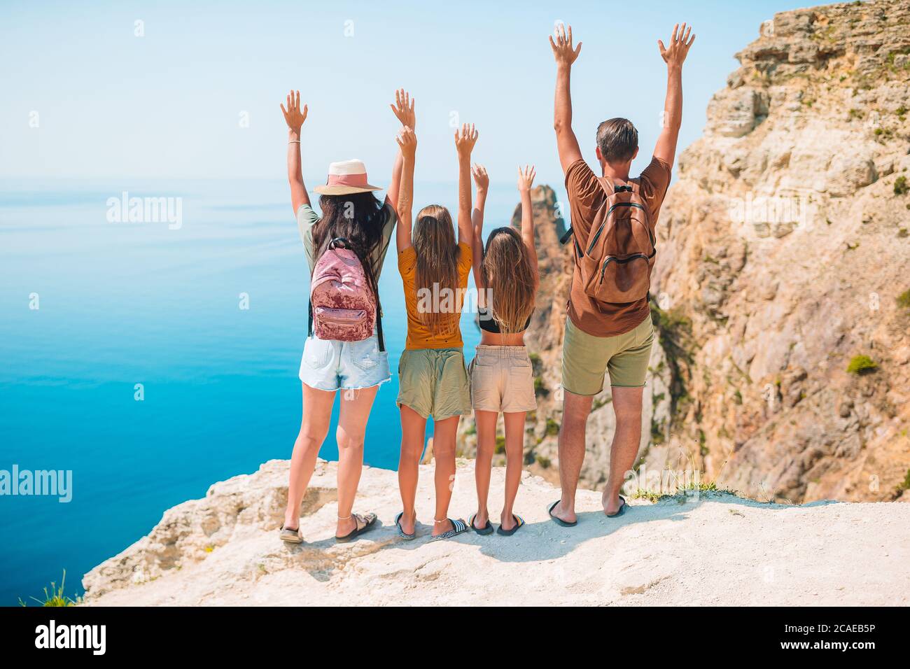 Happy family on vacation in the mountains Stock Photo - Alamy