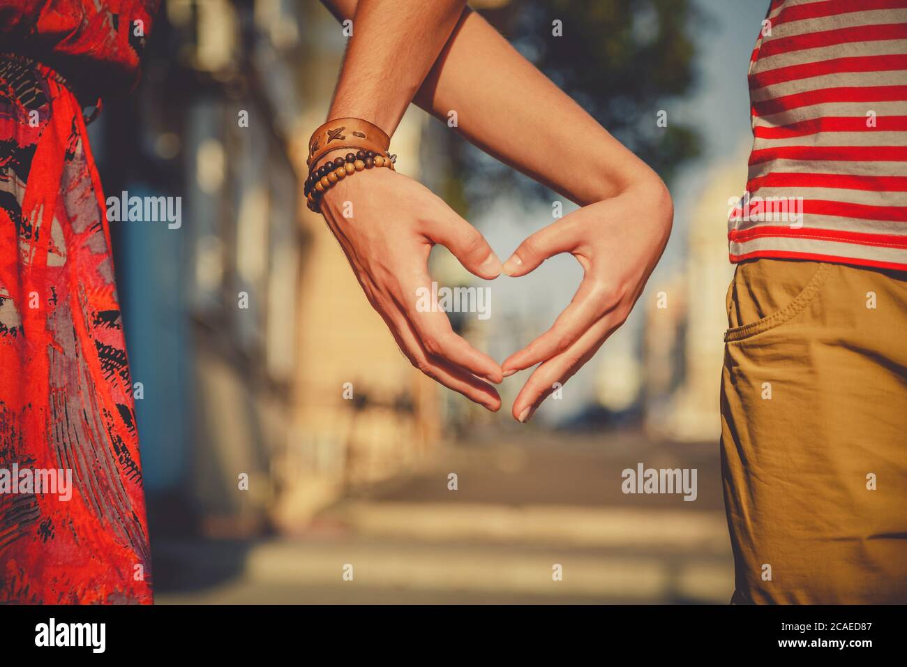Making heart with arms hi-res stock photography and images - Alamy