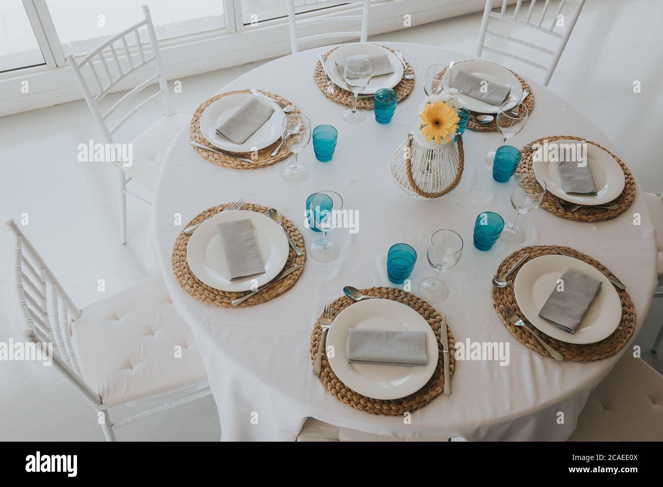 Table setting in a restaurant Stock Photo - Alamy