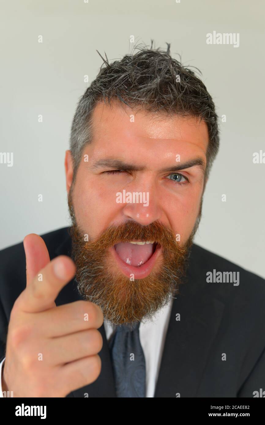 Guy with ginger beard in dark formal suit. Businessman with confident ...