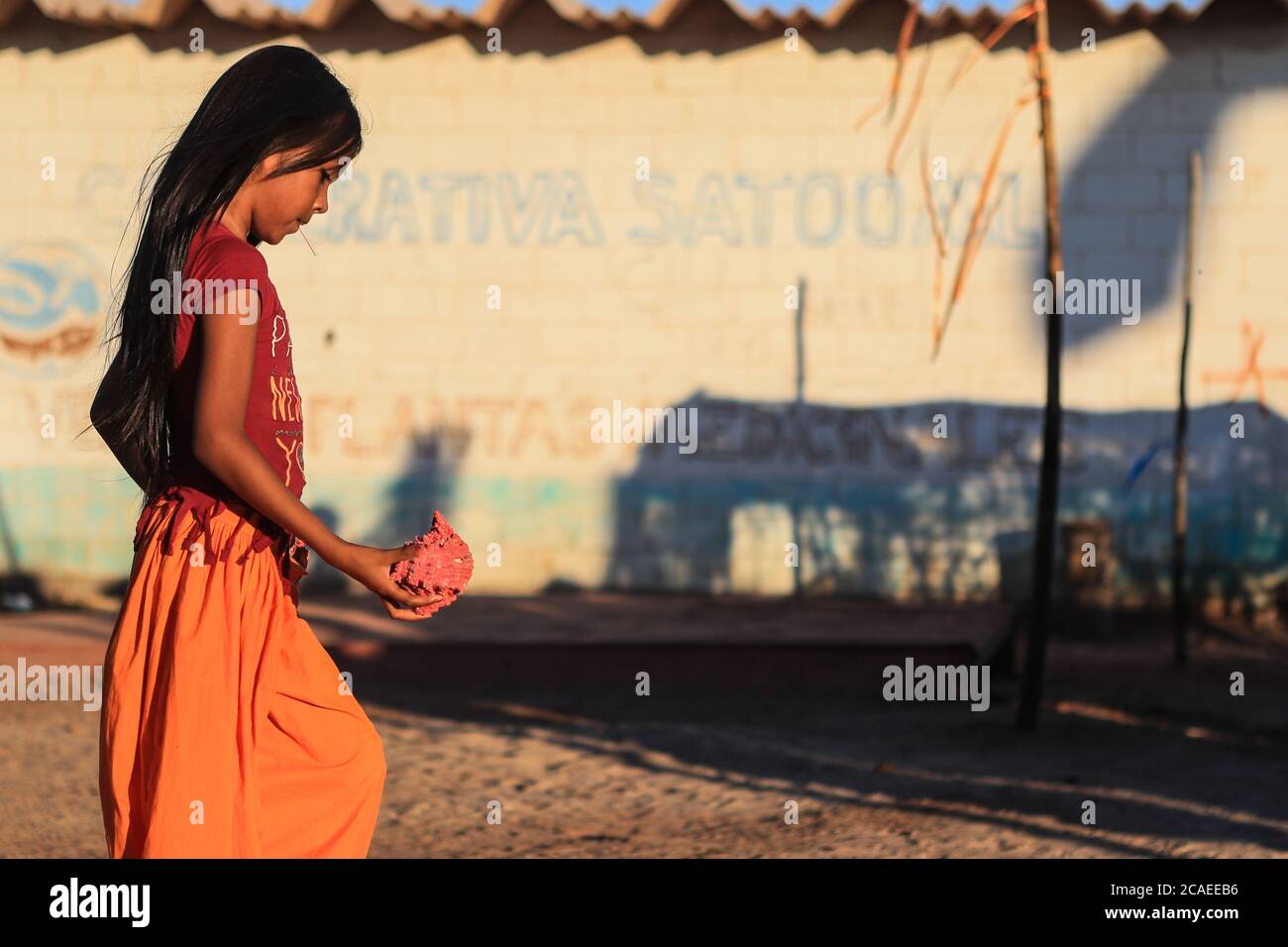 Seri girls will play a traditional game with sea snails during the Seri ...