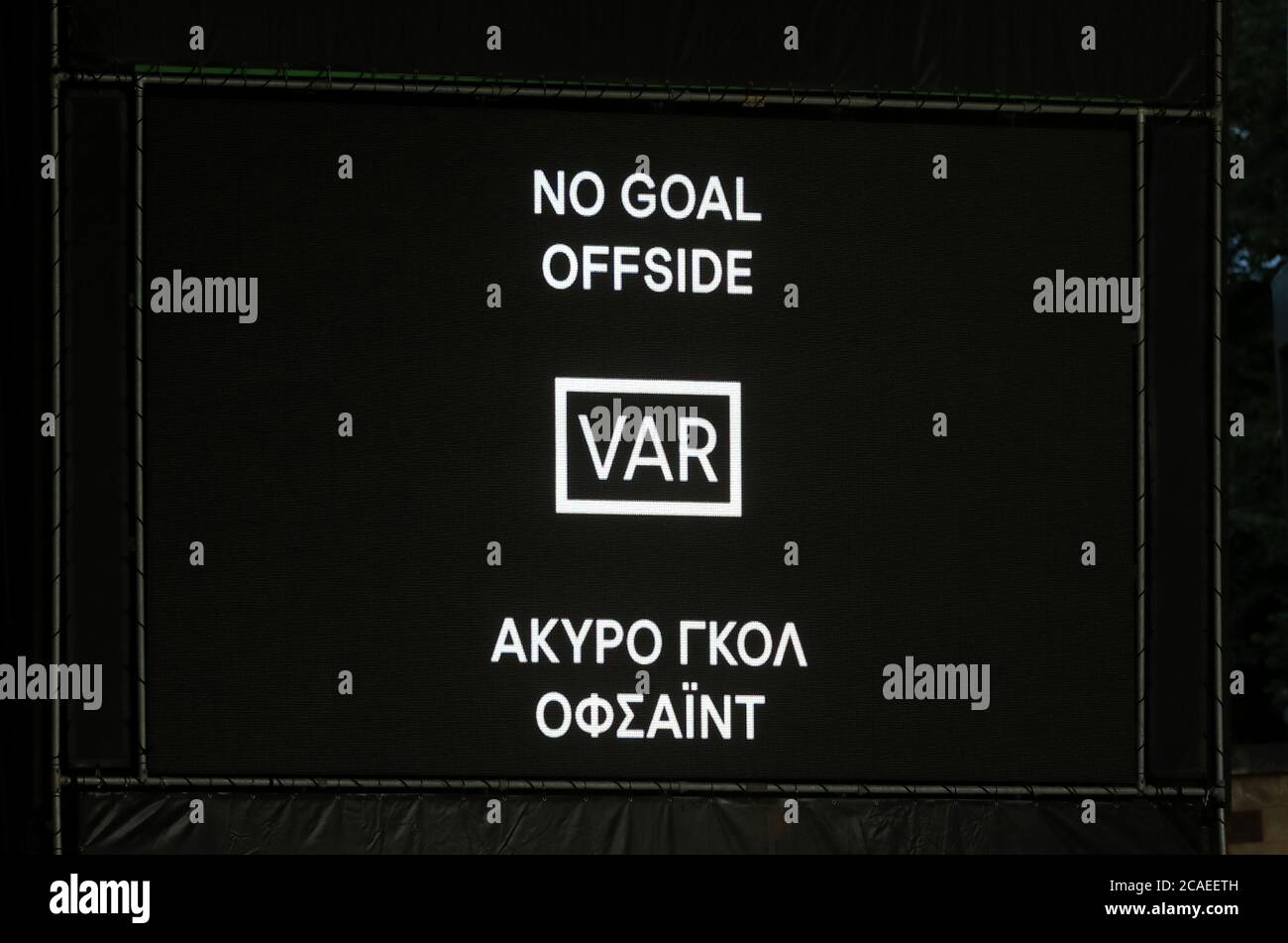 The LED screen alerts the players to the result of a VAR Goal Check ...