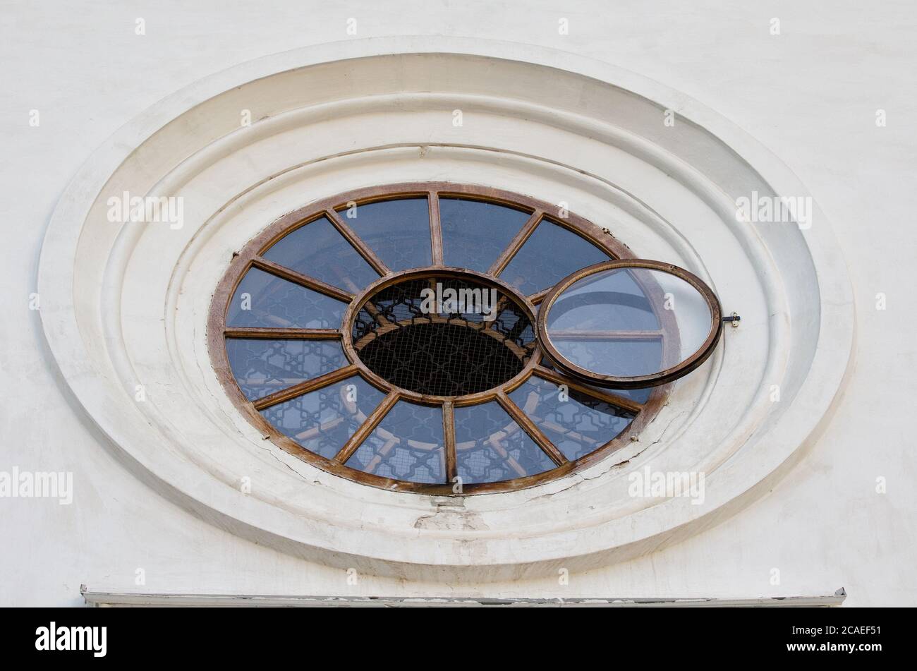 Round window the background of a white wall. Close-up Stock Photo - Alamy