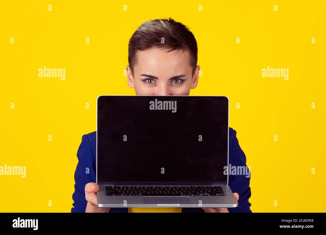 Mid adult businesswoman short hair style girl displaying laptop with ...