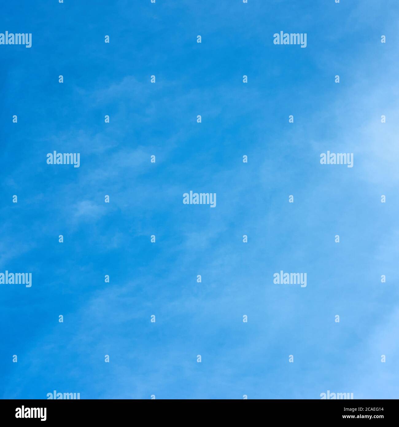Almost cloudless blue sky, may be used as background Stock Photo - Alamy