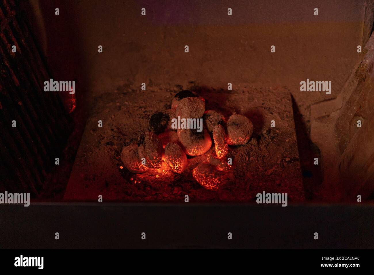 Red hot coals burning in bbq fire place Stock Photo - Alamy