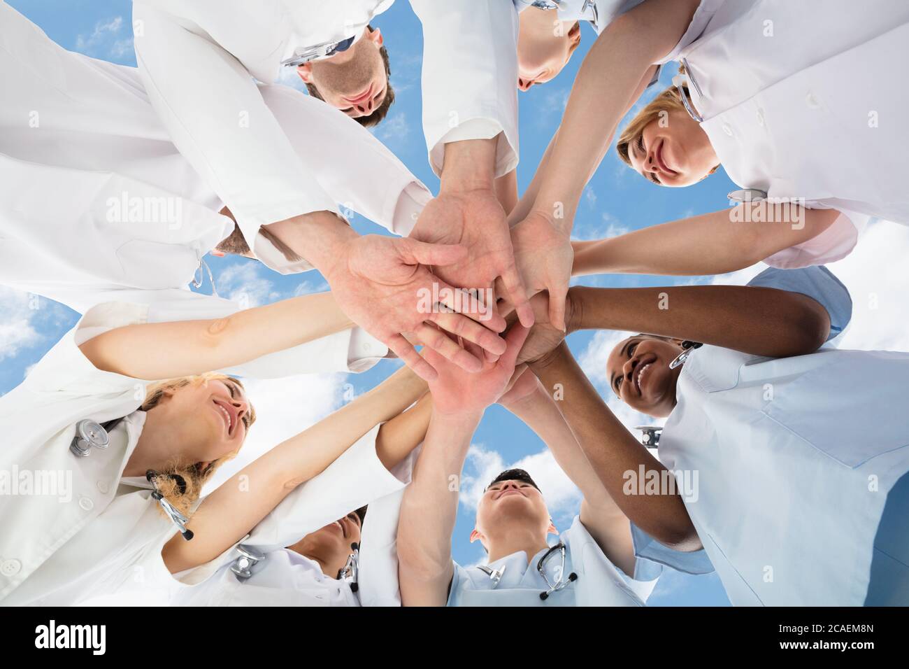 Diverse Medical Team Staff Hands Stack Outdoors Stock Photo - Alamy