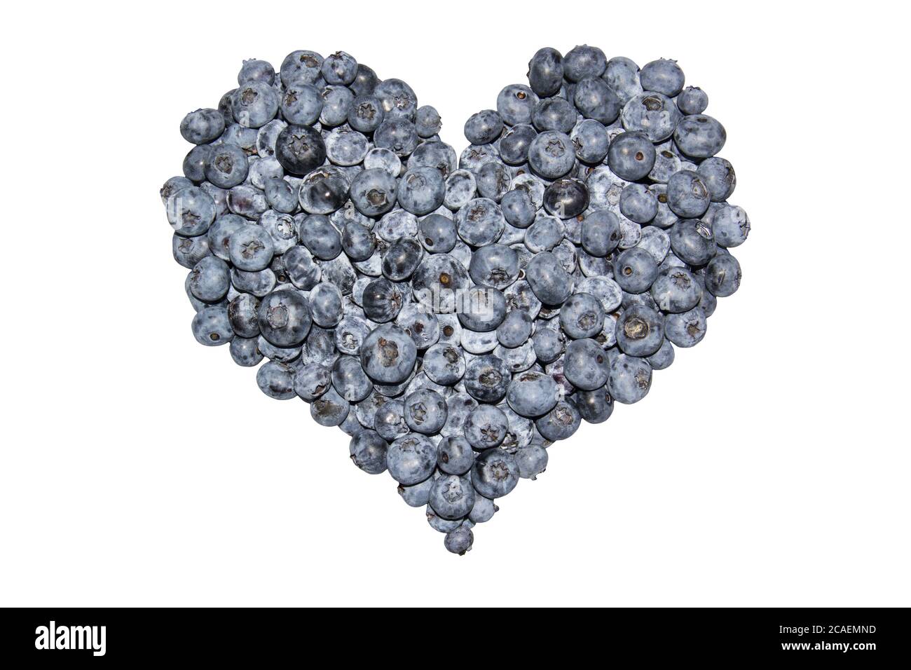 Heart made of ripe blueberry. Isolated on a white background. Juicy ...