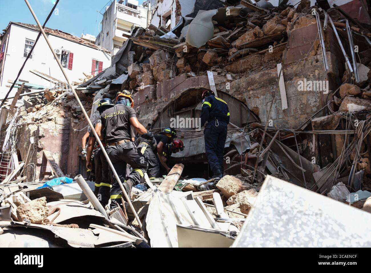 Beirut, Lebanon. 6th Aug, 2020. Lebanese Firefighters enter a collapsed ...