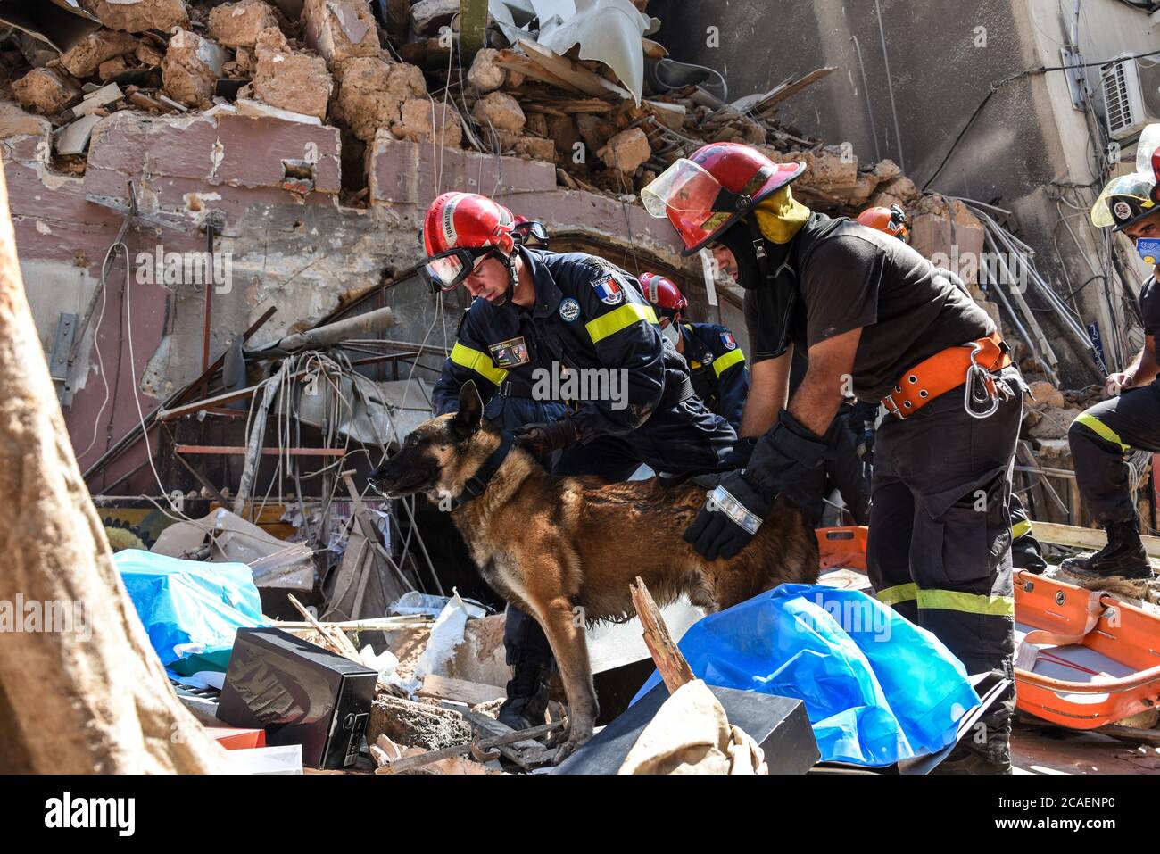 Beirut, Lebanon. 6th Aug, 2020. Lebanese Firefighters enter a collapsed ...