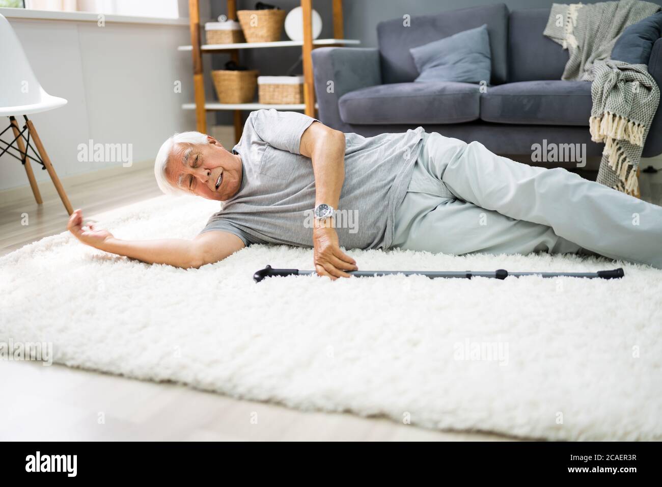 Elderly Senior Man Slip And Fall. Fallen Old Person Stock Photo - Alamy