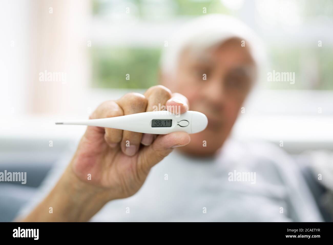 Sick patient temperature hi-res stock photography and images - Alamy