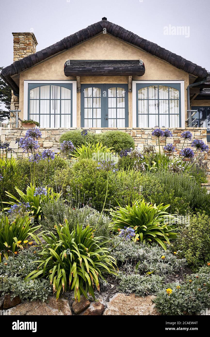 Creative landscape design on background of a beautiful house Stock ...