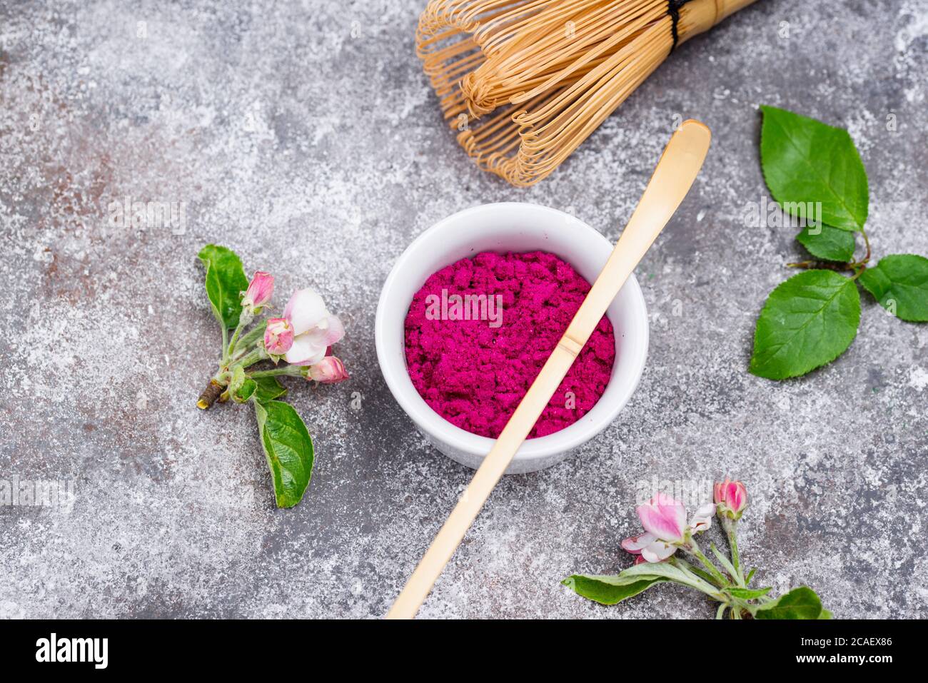 Pink matcha powder from dragon fruit Stock Photo - Alamy