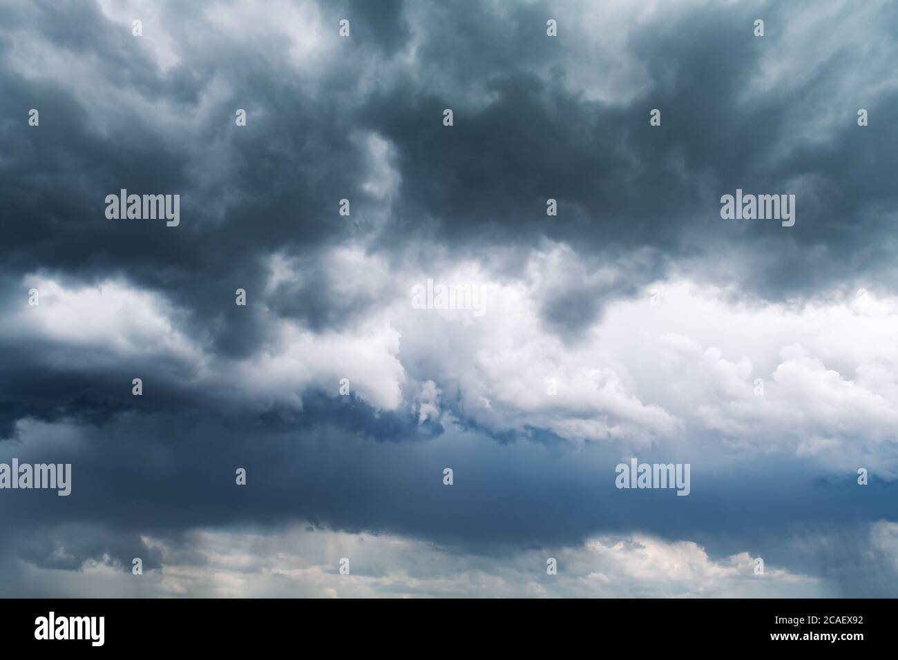 Dramatic storm clouds with rain closeup. Nature background Stock Photo ...