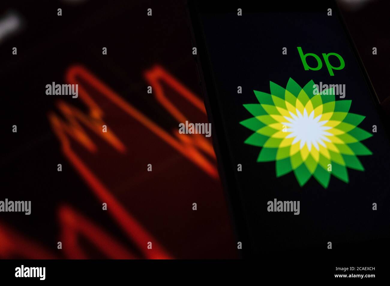 In this photo illustration a bp logo is seen displayed on a smartphone ...