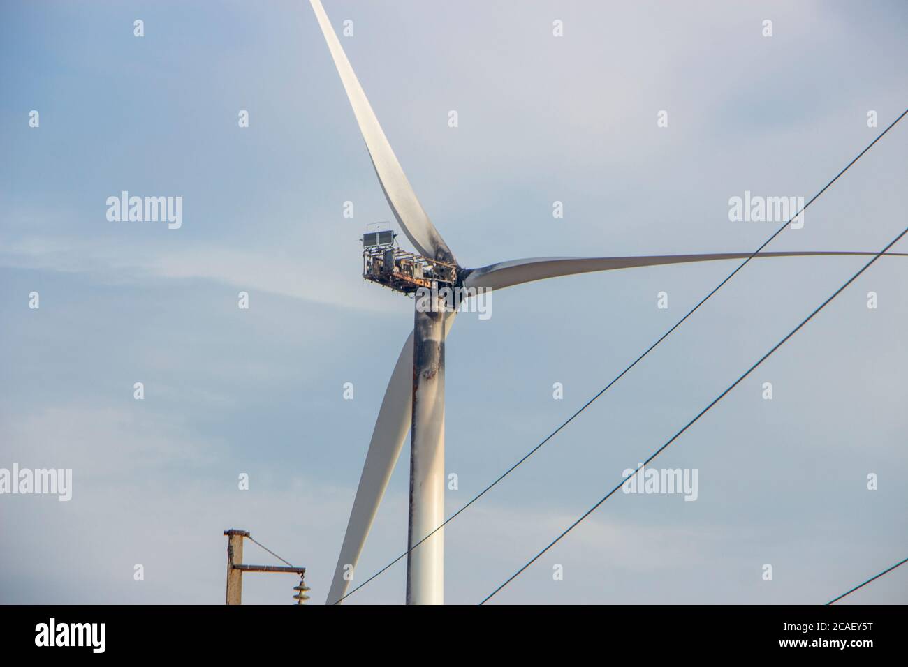 Fire at the wind farm, destroyed windmill, burned wind generator. Power ...
