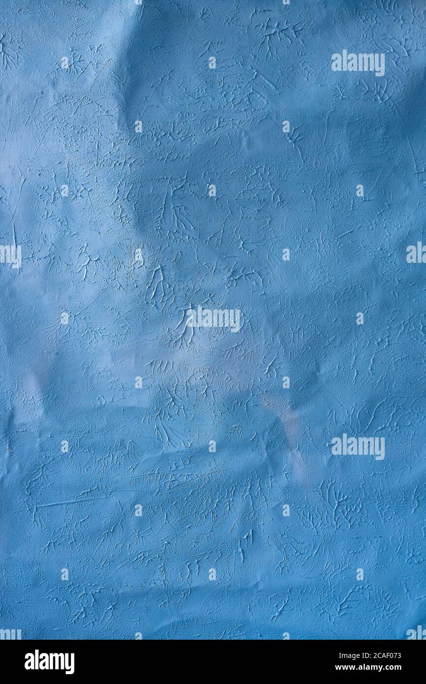 texture crumpled background of blue color close-up, crumpled and with ...