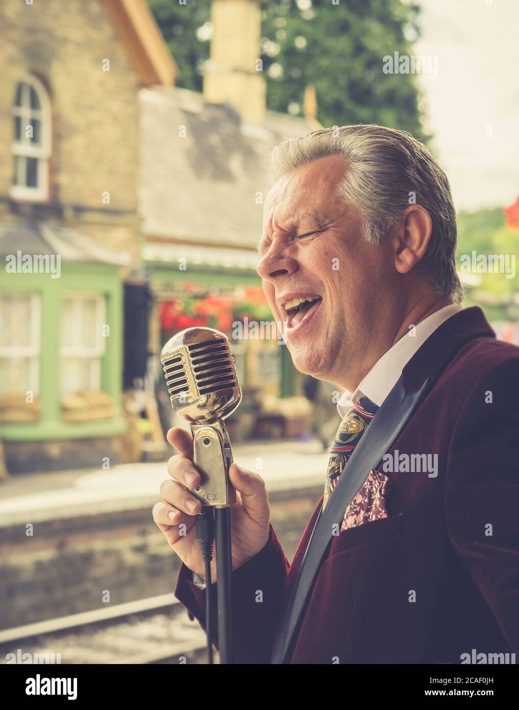 Close-up isolated male singer performing at Arley Station, Severn ...