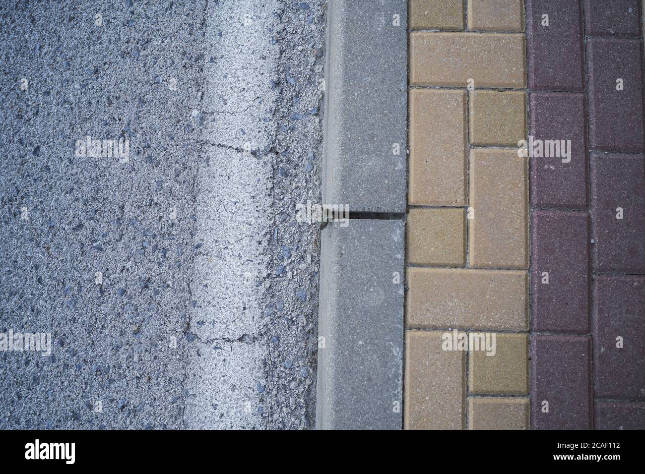 Top view of clinker paving stone along with the road Stock Photo - Alamy