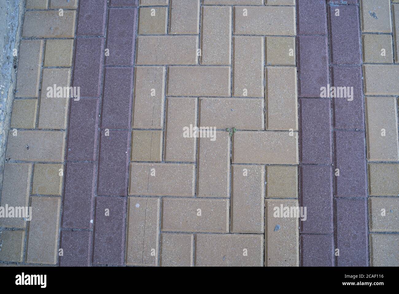 Top view of clinker paving stone along with the road Stock Photo - Alamy