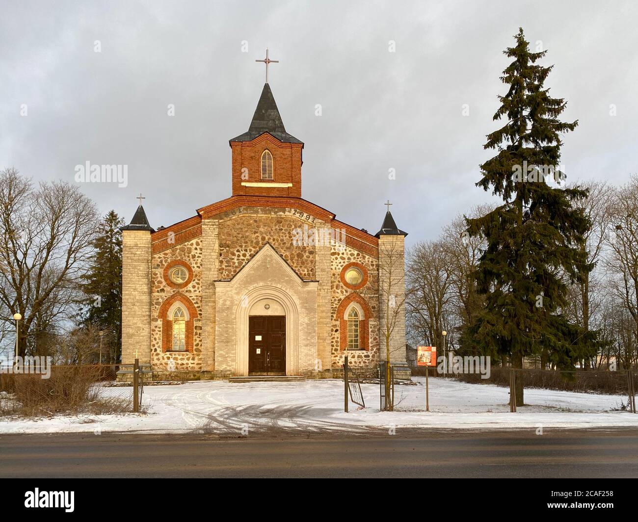 Facade of an old stone church. Architecture Stock Photo - Alamy