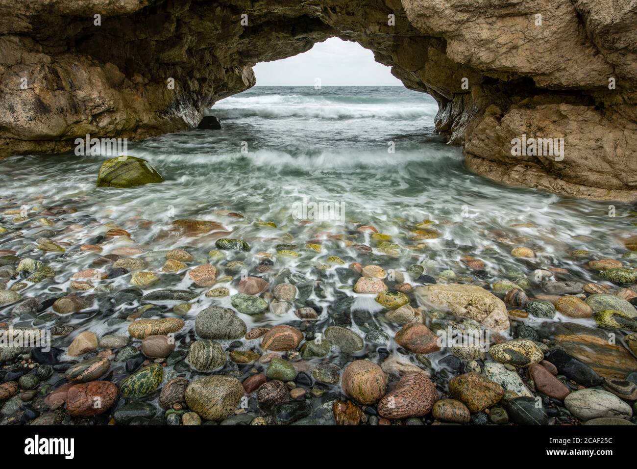 Surf and rocks under the Arches, Arches Provincial Park, Newfoundland ...