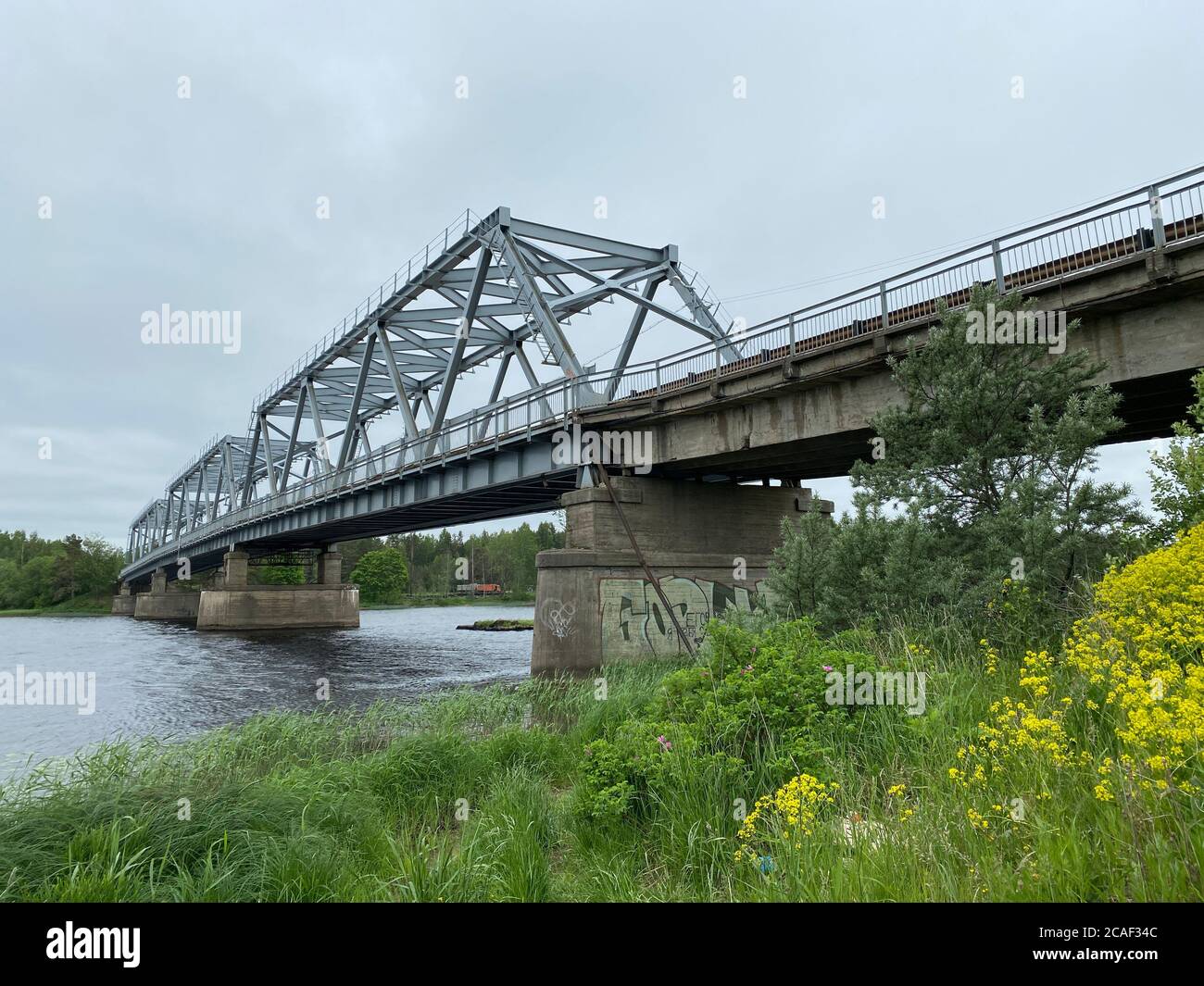 a bridge over a body of water Stock Photo - Alamy