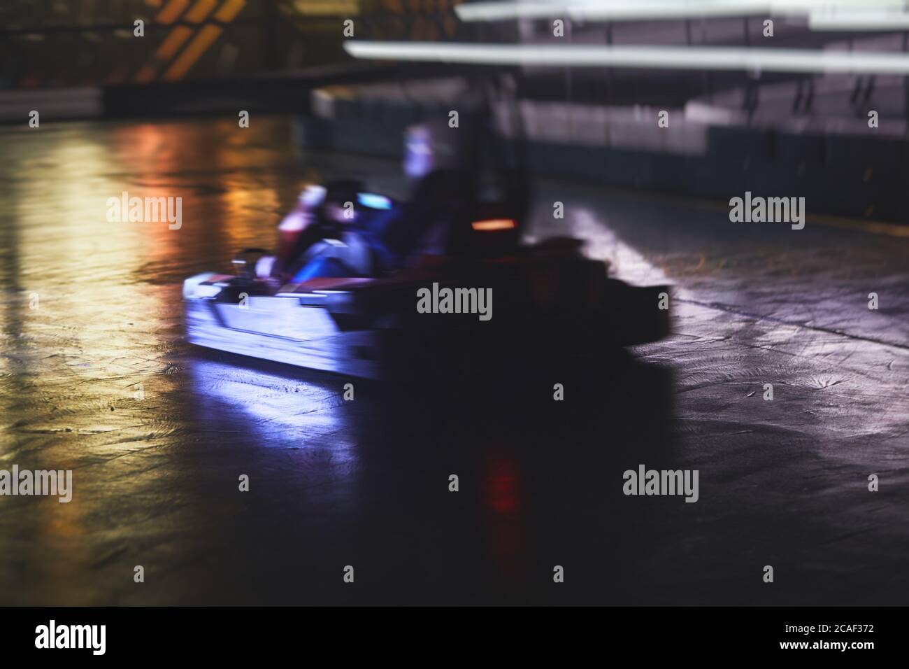 View of indoor karting racetrack, go-kart competition, go-cart racing ...