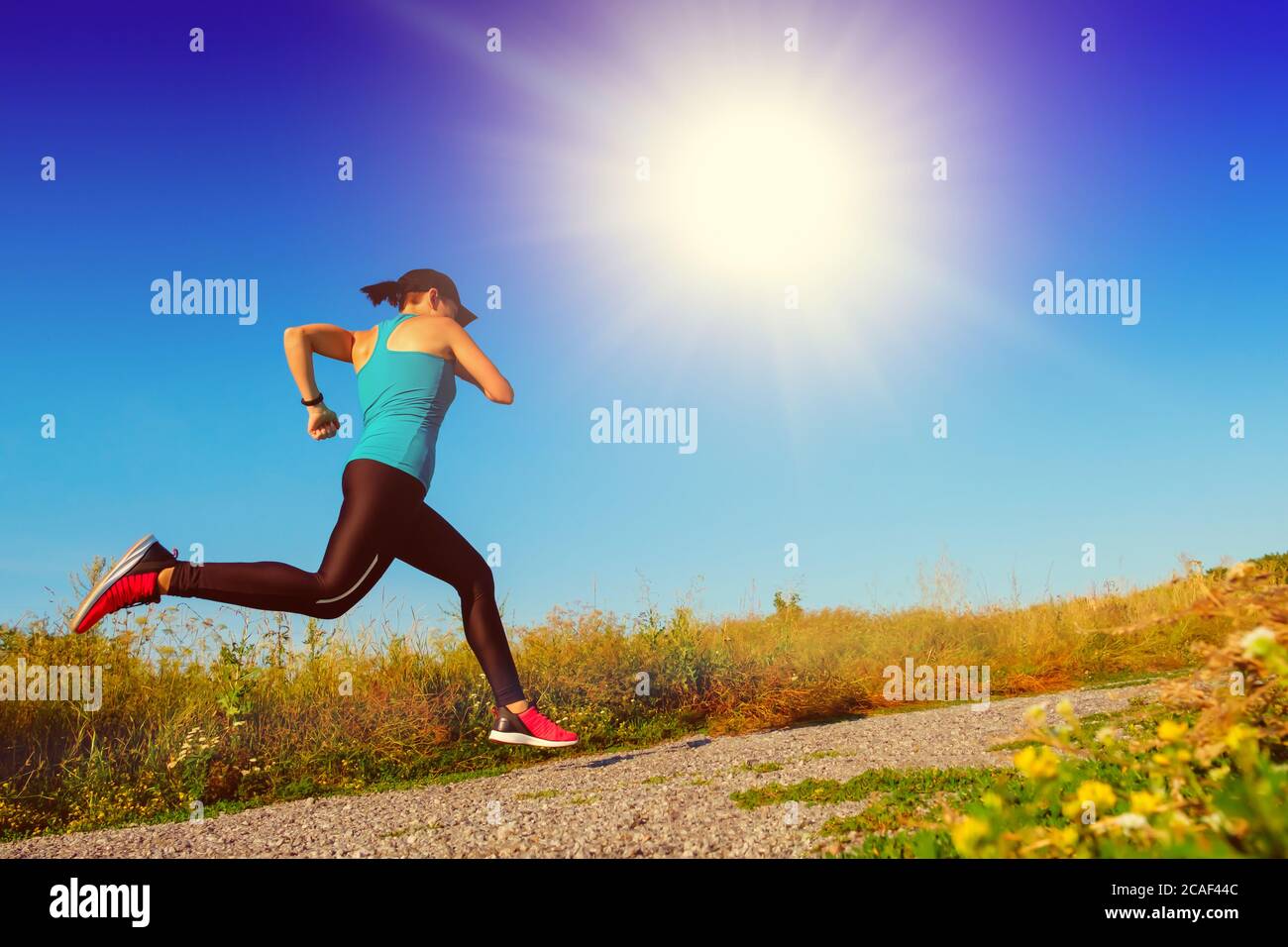 Woman jogging low angle hi-res stock photography and images - Alamy