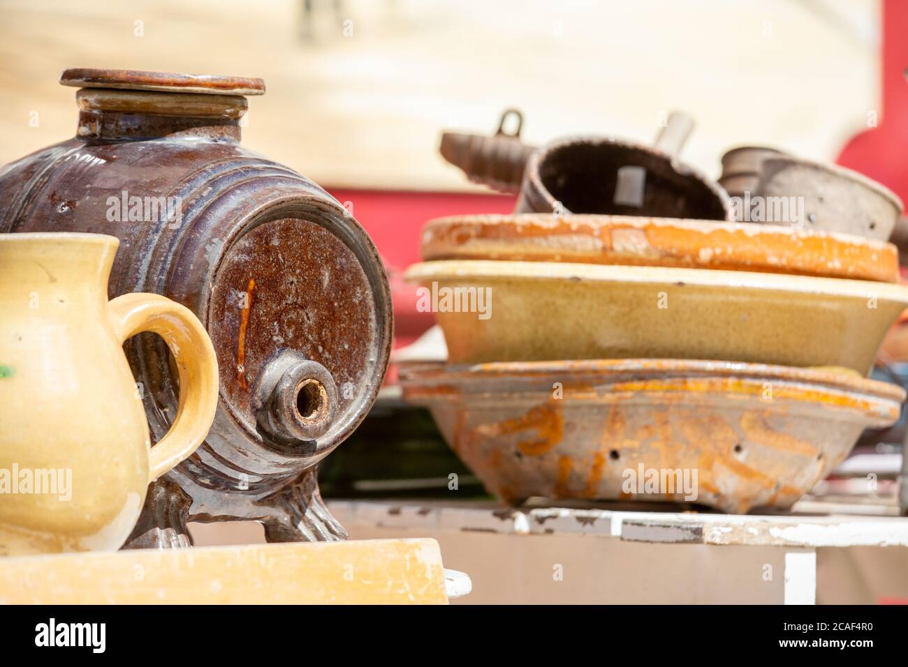 Group of rustic items for sale at a village flea market Stock Photo - Alamy