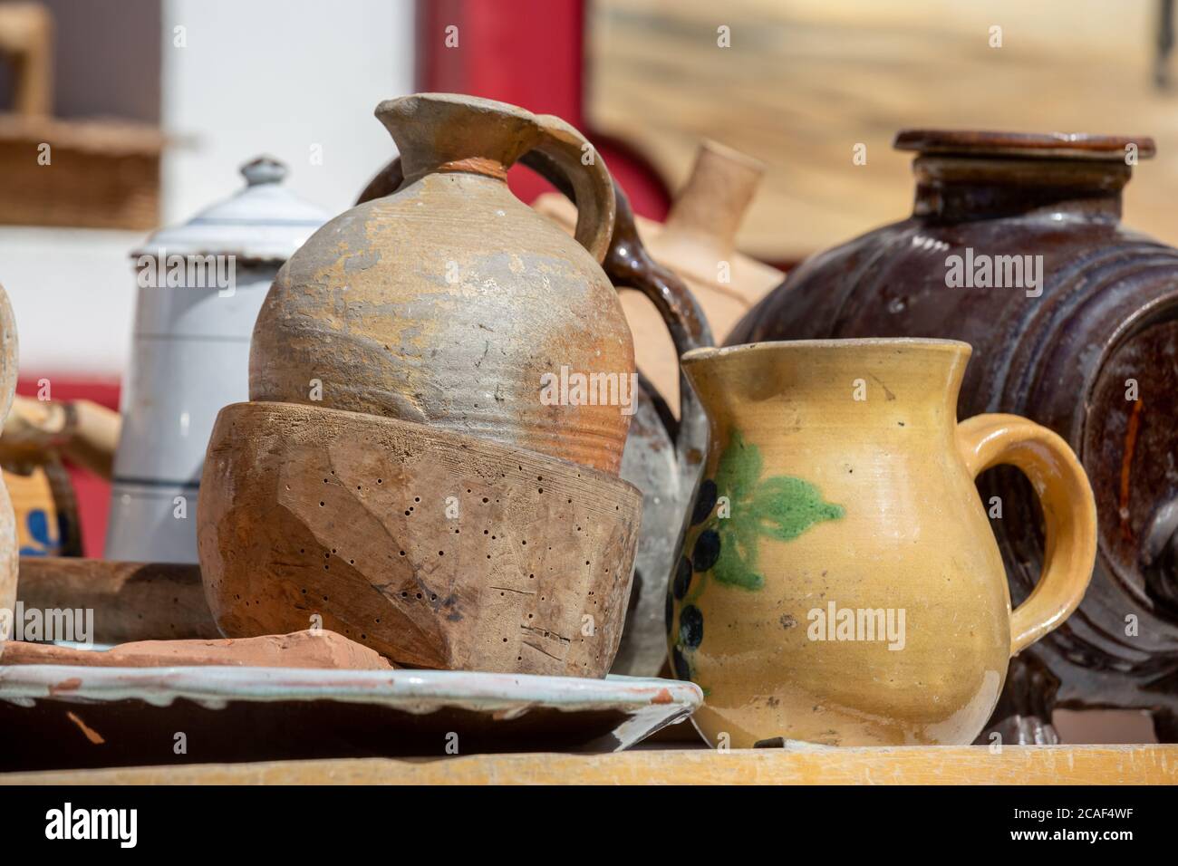 Group of rustic items for sale at a village flea market Stock Photo - Alamy