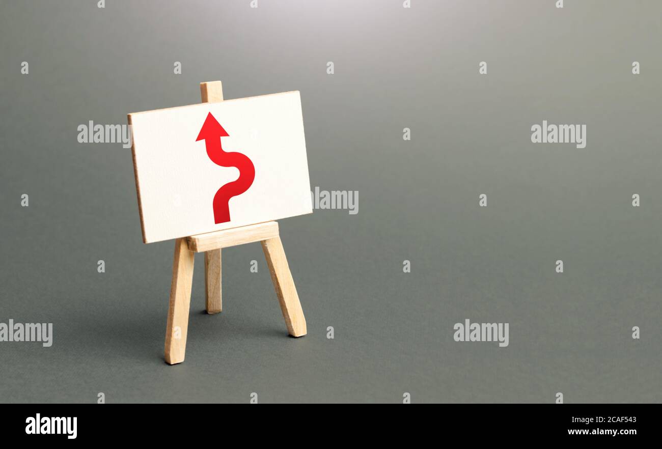 An easel with a red arrow avoiding an obstacle. Purposefulness and ...