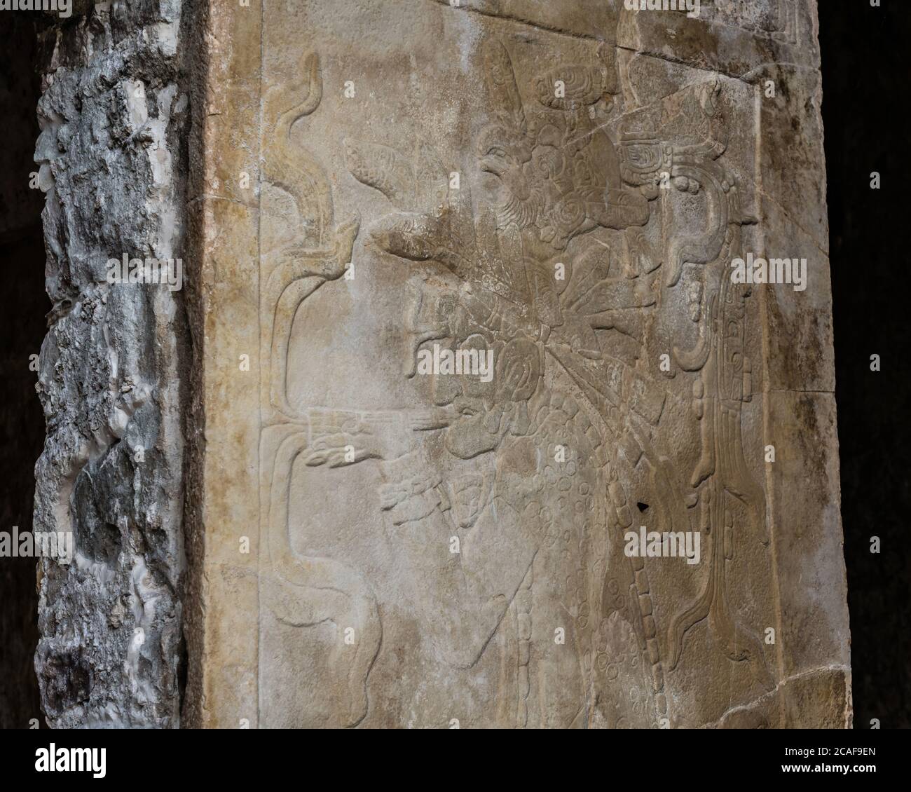 A carved stone panel in the Temple of the Cross showing the cigar ...