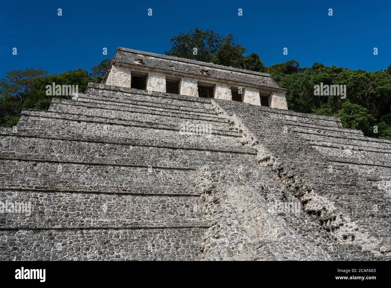 The Temple of the Inscriptions in the ruins of the Mayan city of ...