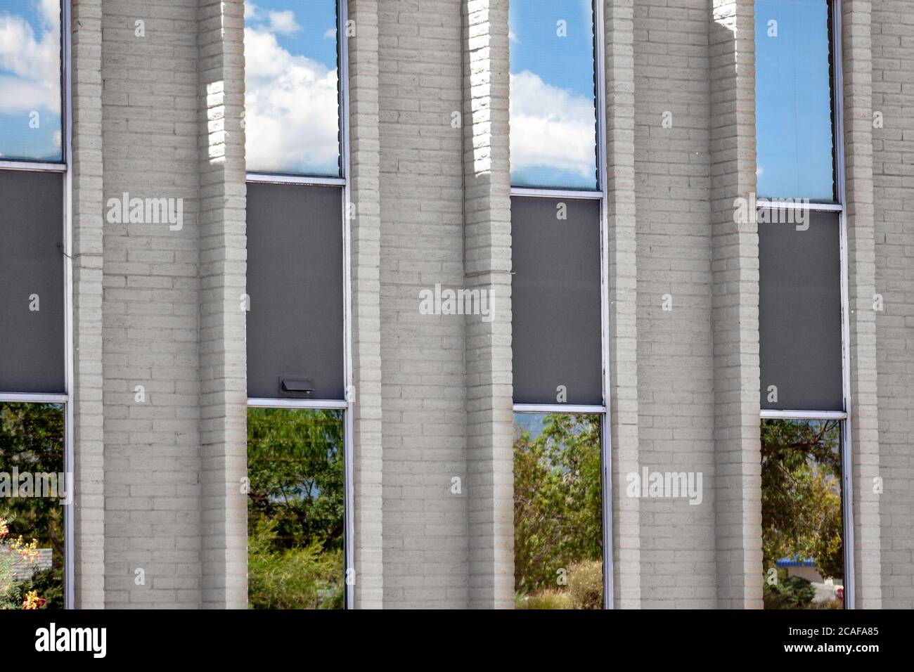 Abstract view of reflective windows on an office building in ...