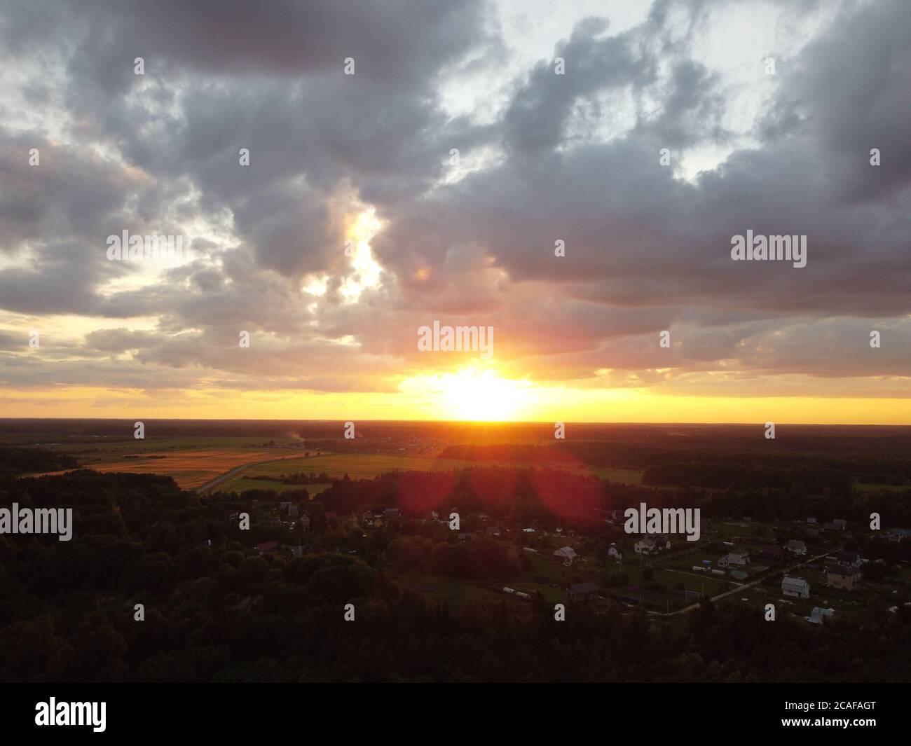 sunset sky with clouds background Stock Photo - Alamy