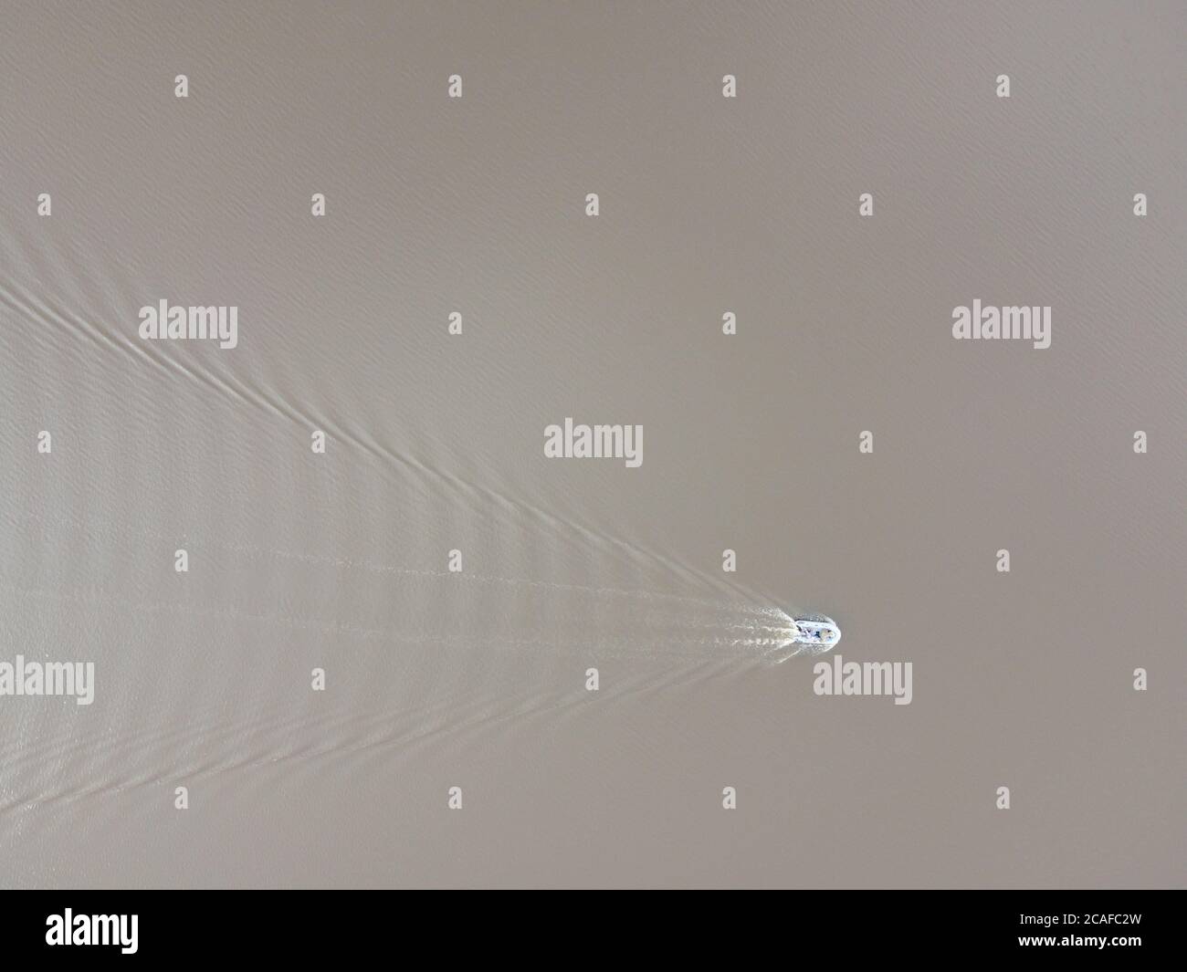 motor boat floating in a lake Stock Photo - Alamy